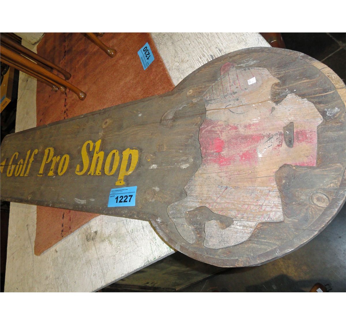 Wooden golf pro shop sign
