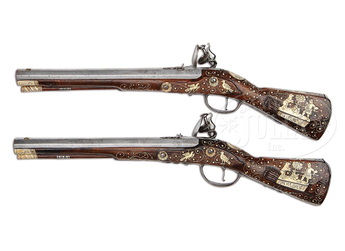 VERY FINE PAIR OF 17TH CENTURY GERMANIC GUN BUTT FLINTLOCK PISTOLS.