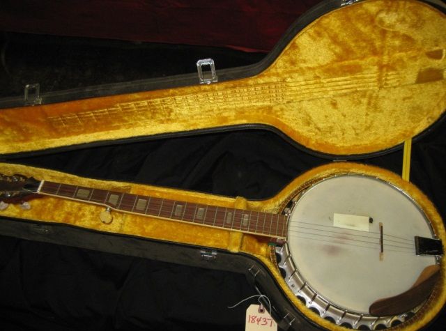 Jida 4 String Banjo with case.and strap.