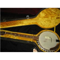 Jida 4 String Banjo with case.and strap.