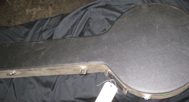 Jida 4 String Banjo with case.and strap.