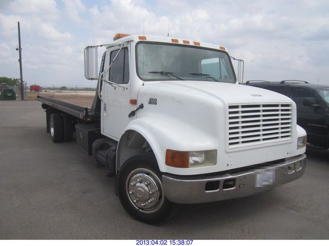 2001 INTERNATIONAL 4700 ROLL BACK TOW TRUCK