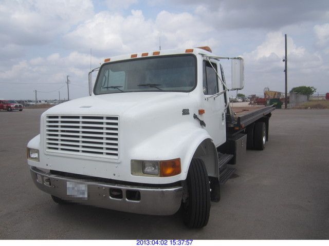 2001 INTERNATIONAL 4700 ROLL BACK TOW TRUCK