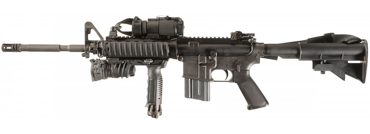 Colt AR-15 Model SP1 Semi-Automatic Rifle with a SureFire Weapon Light ...
