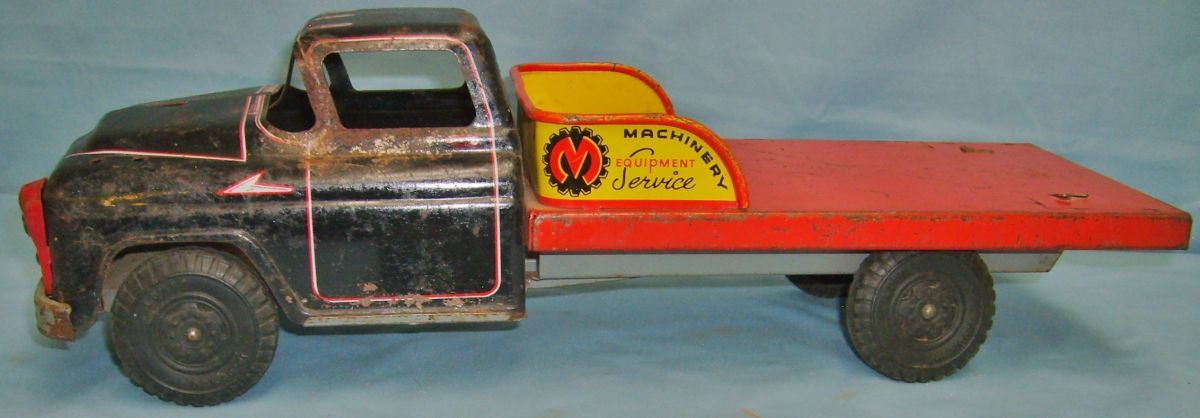 2 toys: MARX Lumar Contractors dump truck, 17”L, light rust; 130 MARX ...