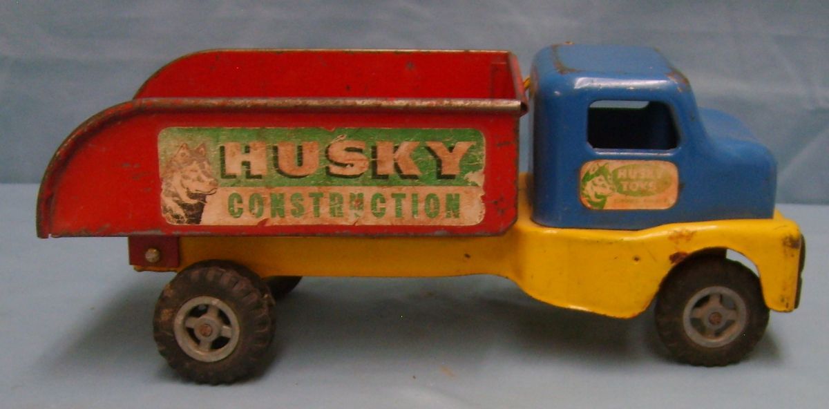 2 toys: Dump truck, no name, new paint, metal wheels and tires, 22”L ...