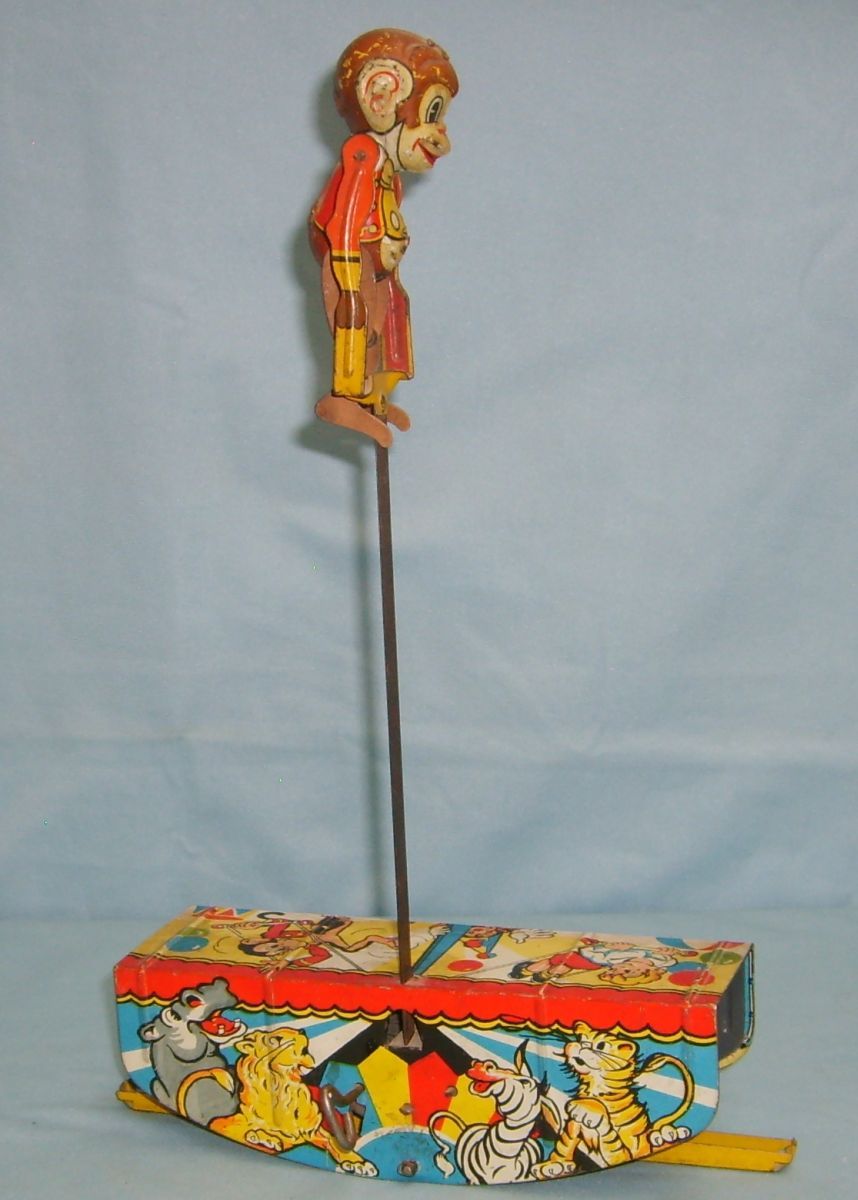 MARX Acrobatic marvel swinging monkey toy, works well, 8”W x 13”H