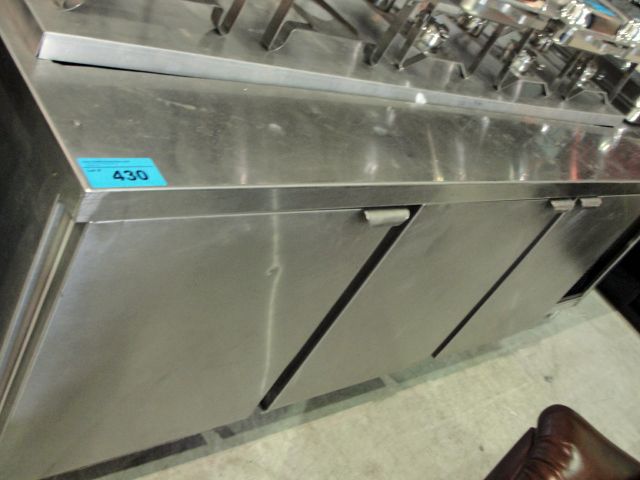 Stainless steel restaurant prep counter with built