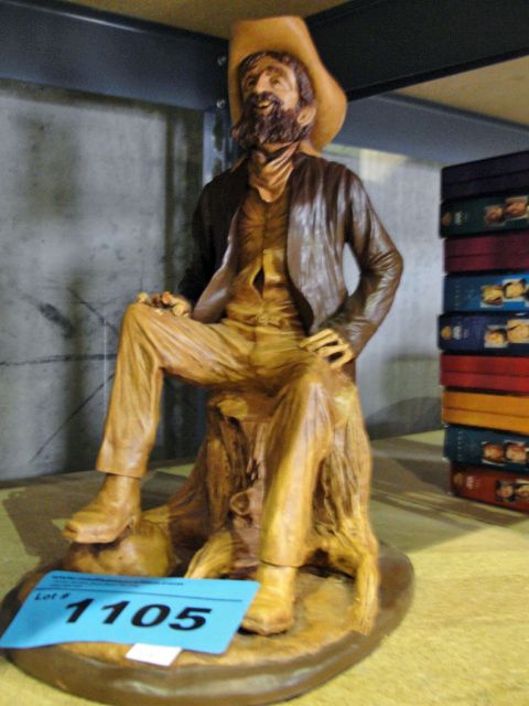 Cast plaster cowboy figurine