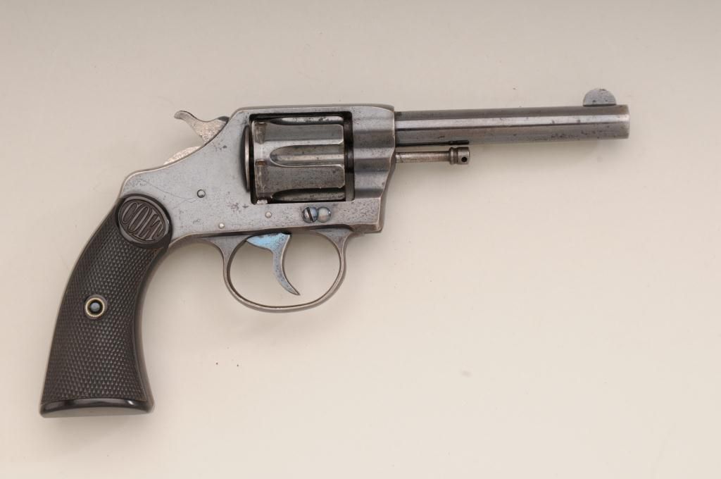 Colt New Police DA revolver, .32 cal., 4” barrel, blue finish ...