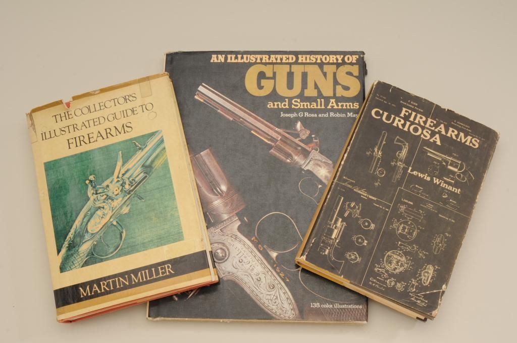 Lot of 7 firearms reference books including “One Hundred Great Guns” by ...