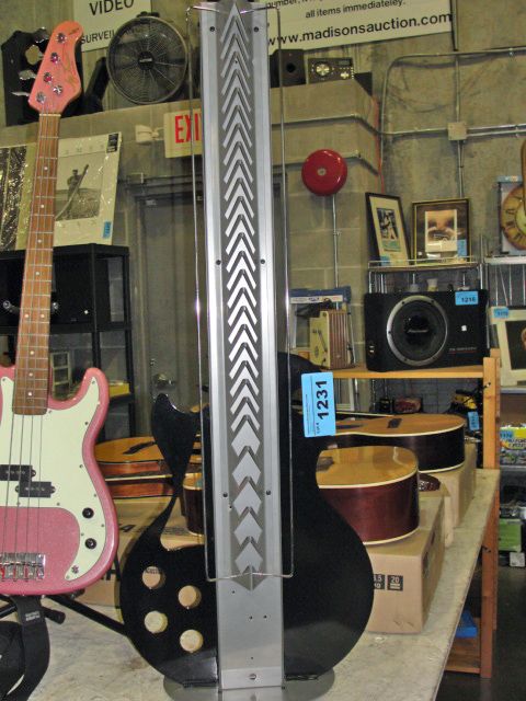 Metal crafted guitar CD storage tower