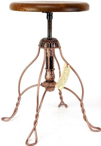Antique metal and oak stool used by early Rosebud