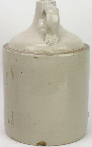 Antique Red Wing marked whiskey advertising jug