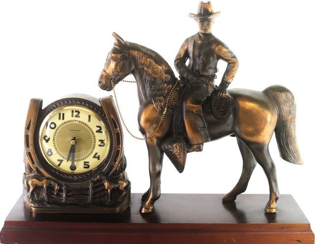 Vintage metal cowboy horse clock