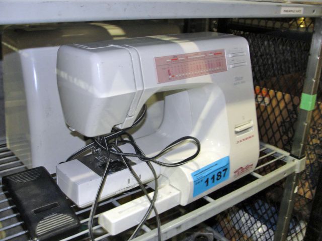 Jenome portable sewing machine