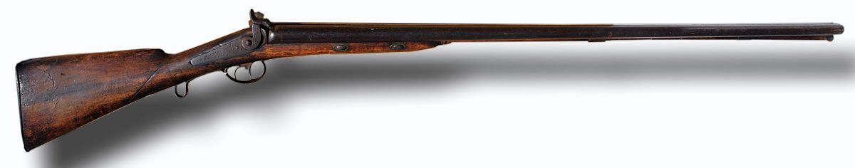 42" barrel, 12 ga. Double barrel percussion shotgun, known as a punt gun