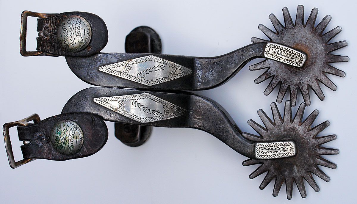 Kelly Bros. extra impressive full double mounted spurs.