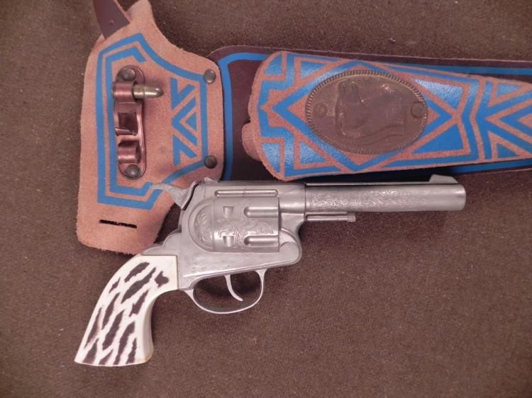 2 1950S DAISY TOY 6-SHOOTER CAP GUNS W/LEATHER HOLSTER