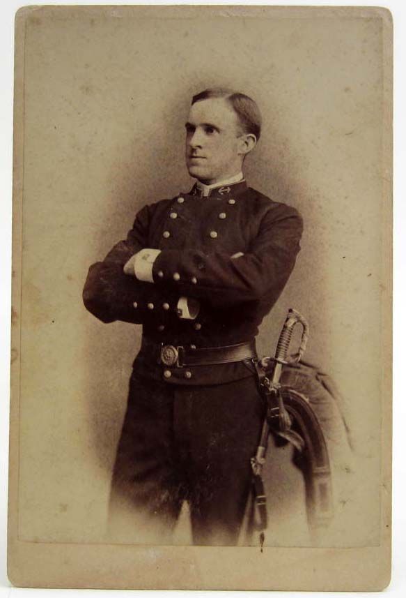 C. 1883 U.S. NAVAL ACADEMY PHOTO OF A SAILOR IN UNIFORM W/ SWORD