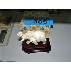 Carved genuine ivory elephant figurine