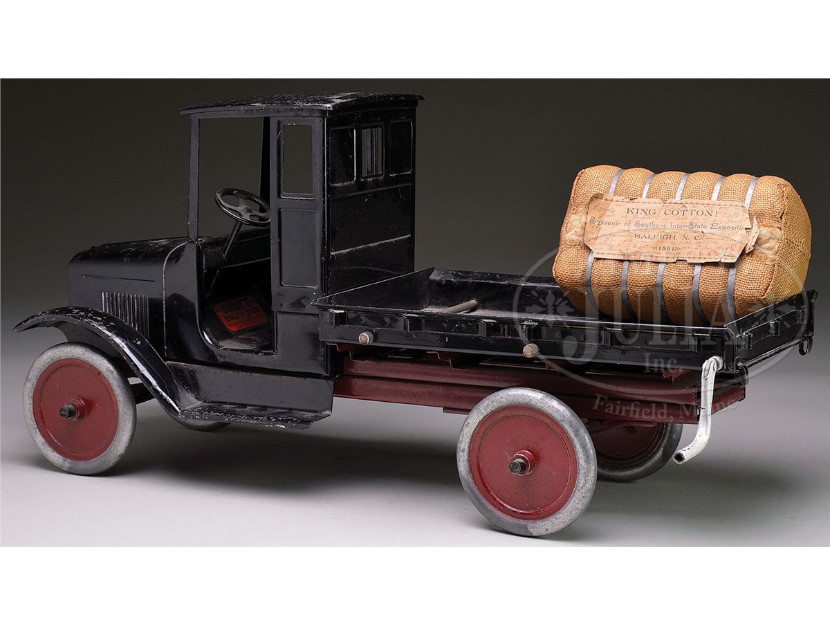BUDDY L STAKE SIDE LUMBER TRUCK.