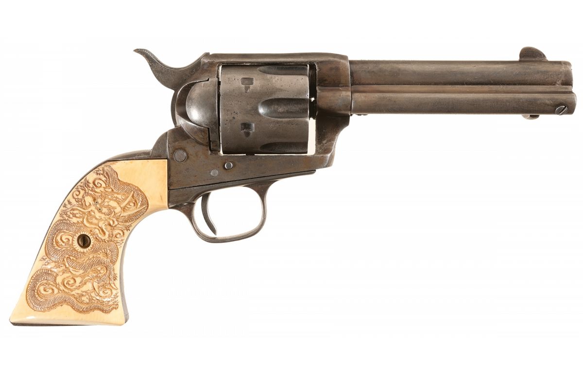 Antique Colt Single Action Army Revolver with Carved Ivory Grips