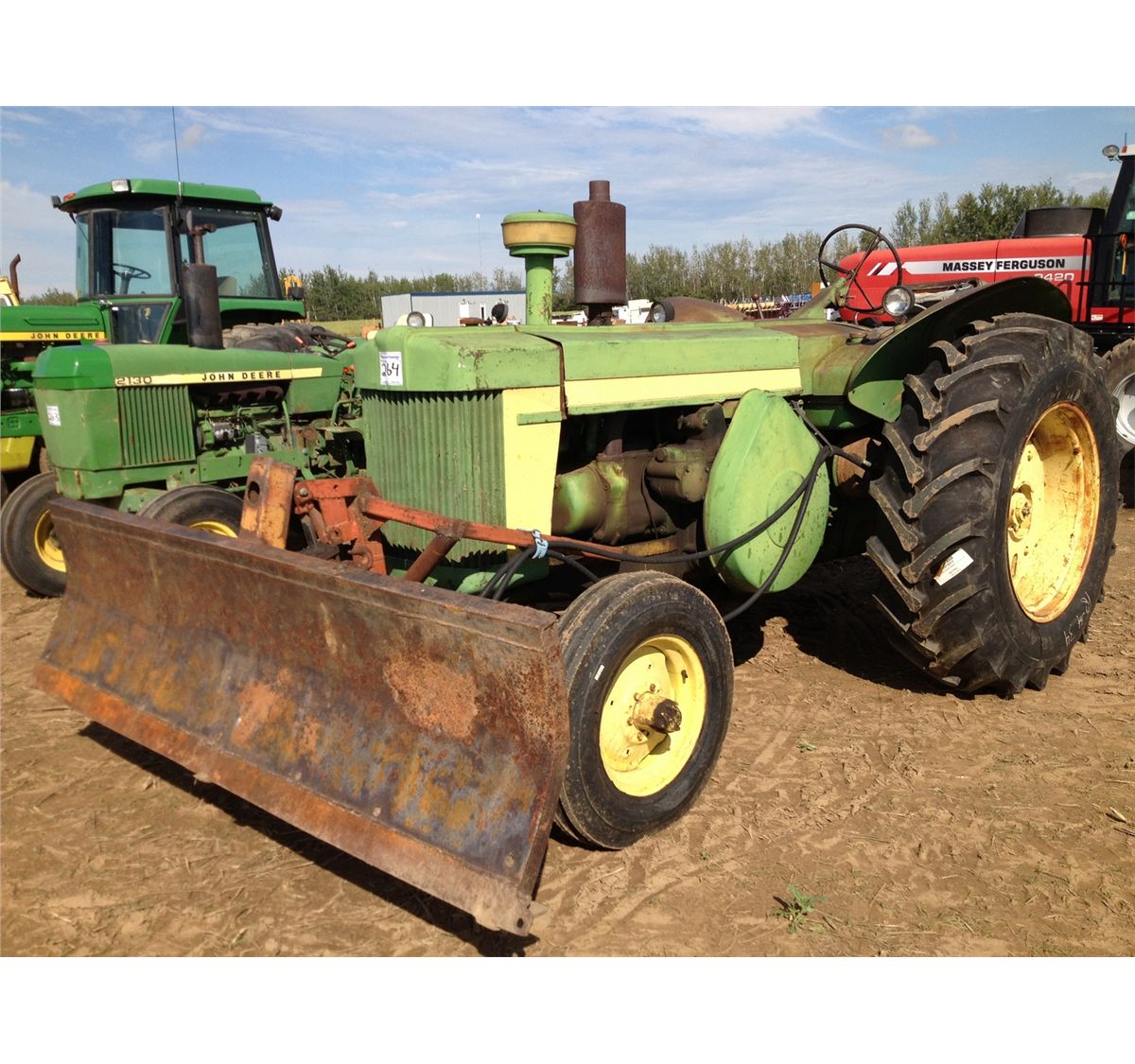 820 TRACTOR C/W DOZER BLADE,2 NEW REAR 18.4X34 TIRES,ONE NEW FRONT