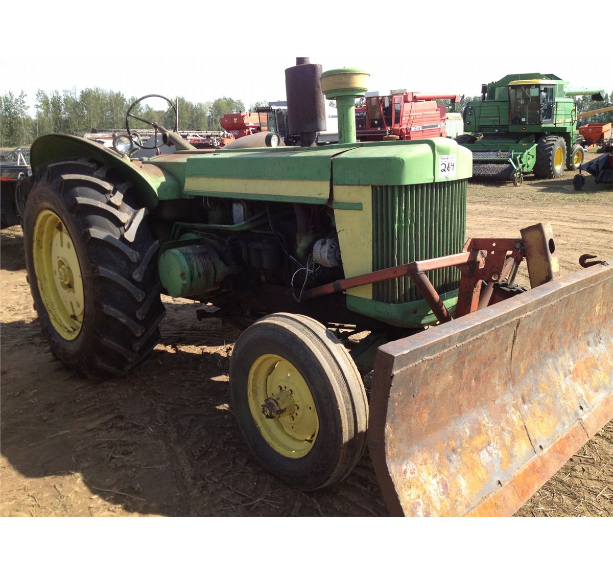 820 TRACTOR C/W DOZER BLADE,2 NEW REAR 18.4X34 TIRES,ONE NEW FRONT