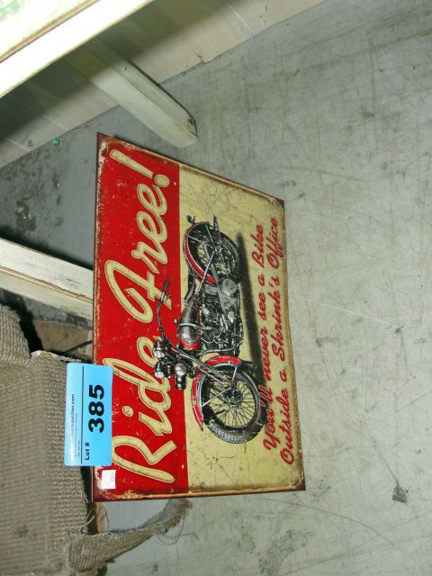 Ride free motorcycle tin advertisment sign