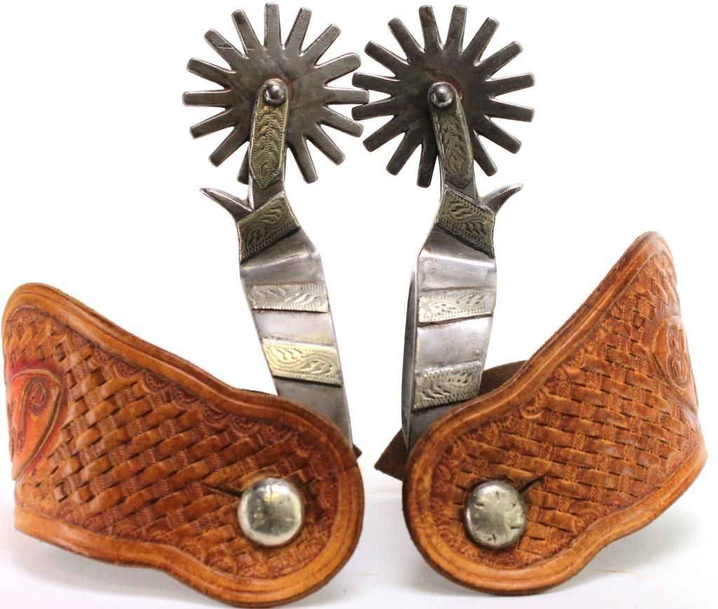 Pair Crockett Renalde single mount spurs with one