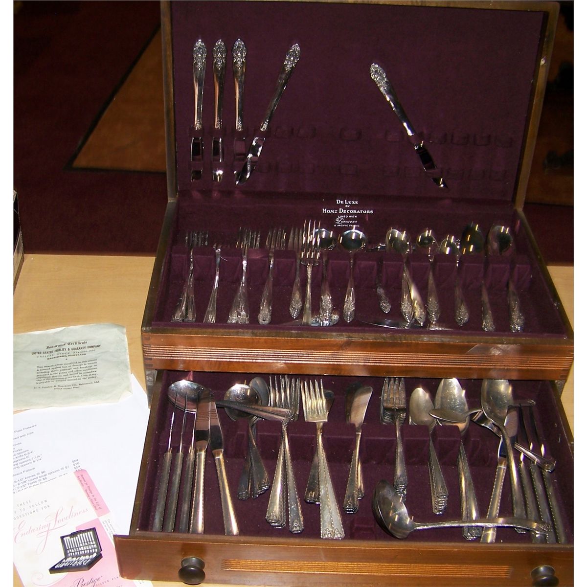 WOODEN BOX OF "PRESTIGE SILVER PLATE" VINTAGE FLATWARE