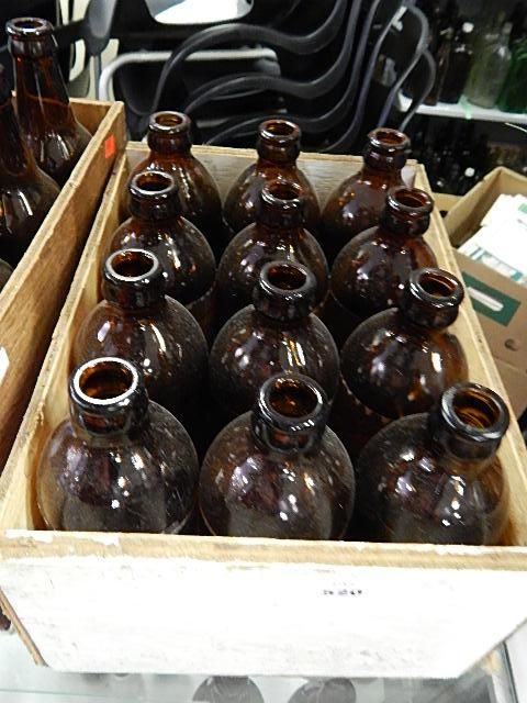 WOOD BOX OF BROWN BEER BOTTLES - SHORT NECK