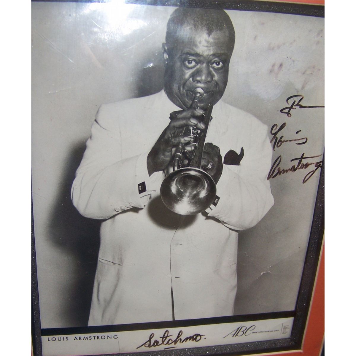 LOUIS ARMSTRONG SIGNED BLACK & WHITE FRAMED PHOTOGRAPH "SATCHMO"