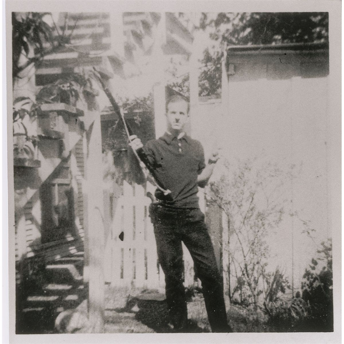 Lee Harvey Oswald Photos in Custody and Holding Rifle