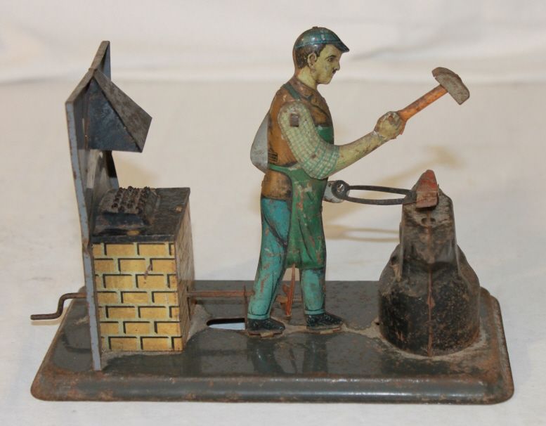 Steam Accessory Blacksmith Wind-up Tin Toy