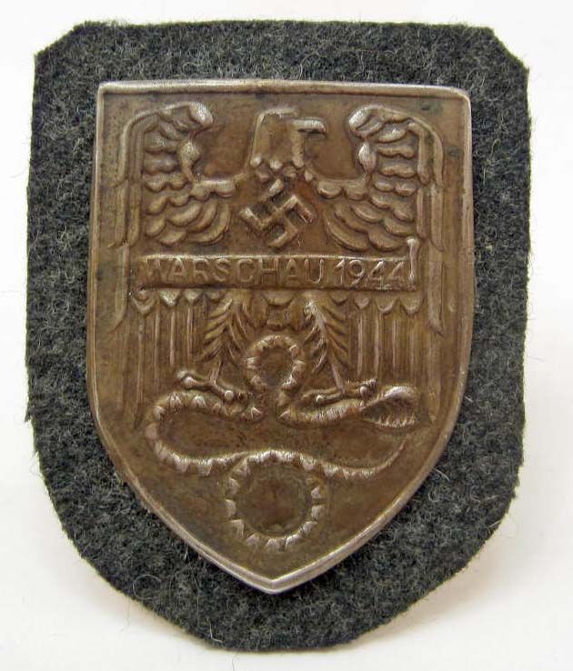 GERMAN NAZI WARSCHAU SHIELD W/ GREEN WOOL BACKING