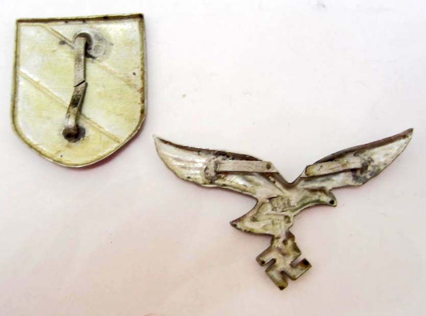 SET OF 2 GERMAN NAZI HELMET BADGES