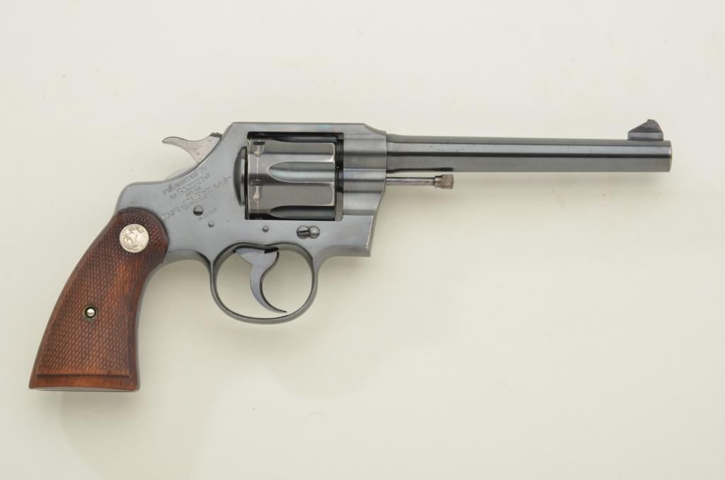 Colt Official Police DA revolver, .38 cal., 6” barrel, blue finish ...