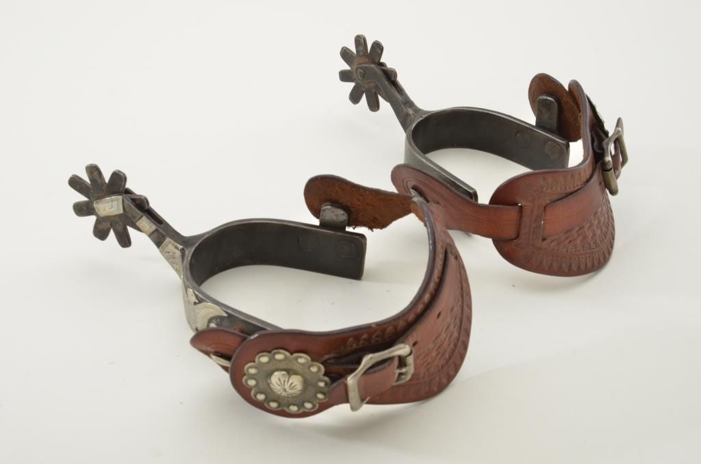 Carl Hall made and marked spurs with Eagle and heart design along with ...