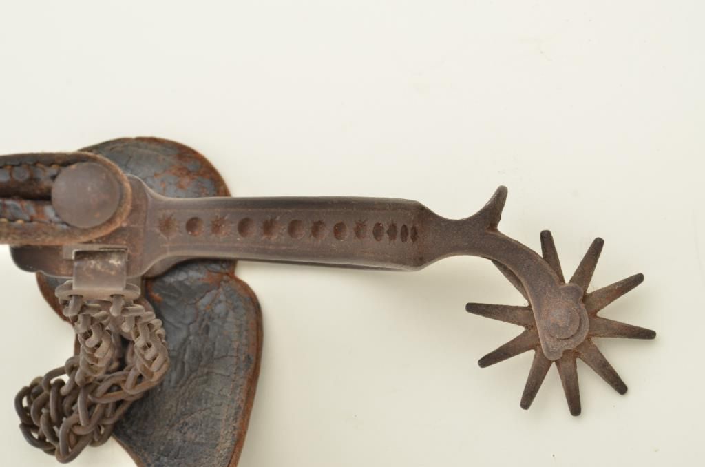 Buermann iron spurs with drop shank showing star C and circle with ...