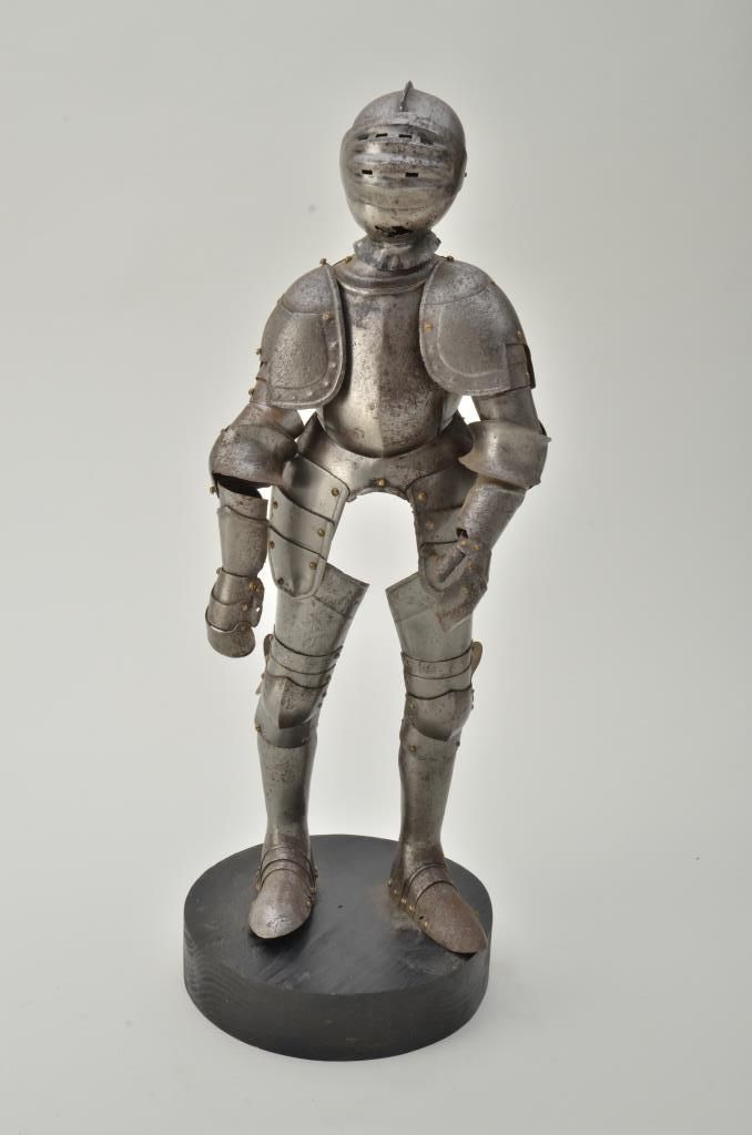 Finely made and articulated set of miniature armor made in about 1/4th ...