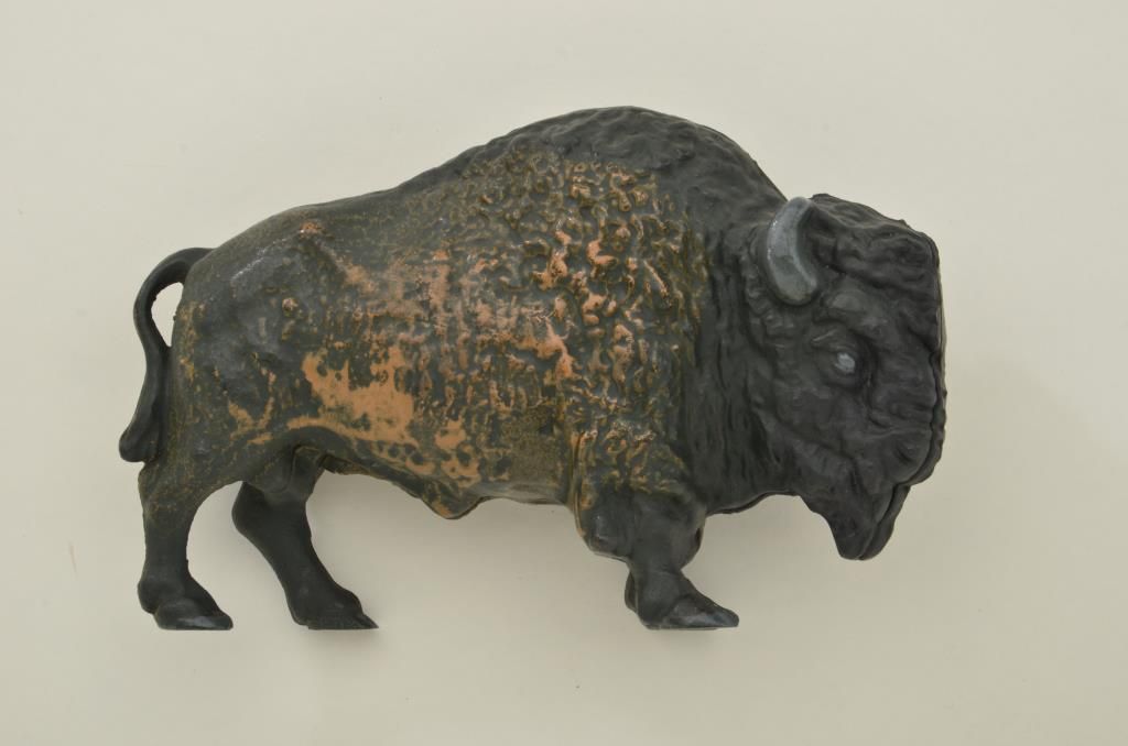 Cast iron antique bank in figure of Buffalo in very good condition ...
