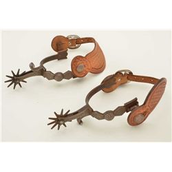 E. Garcia marked and numbered 11-1233 Western-style spurs with fancy ...
