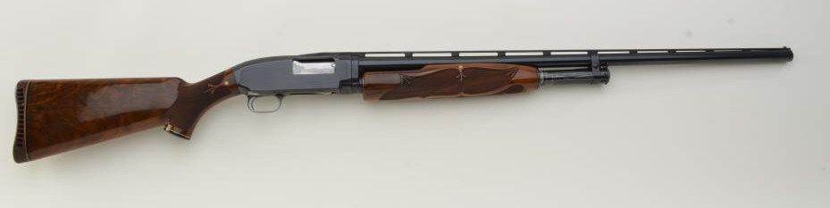 Winchester model 12, 12gauge pump action shotgun with elaborate custom ...