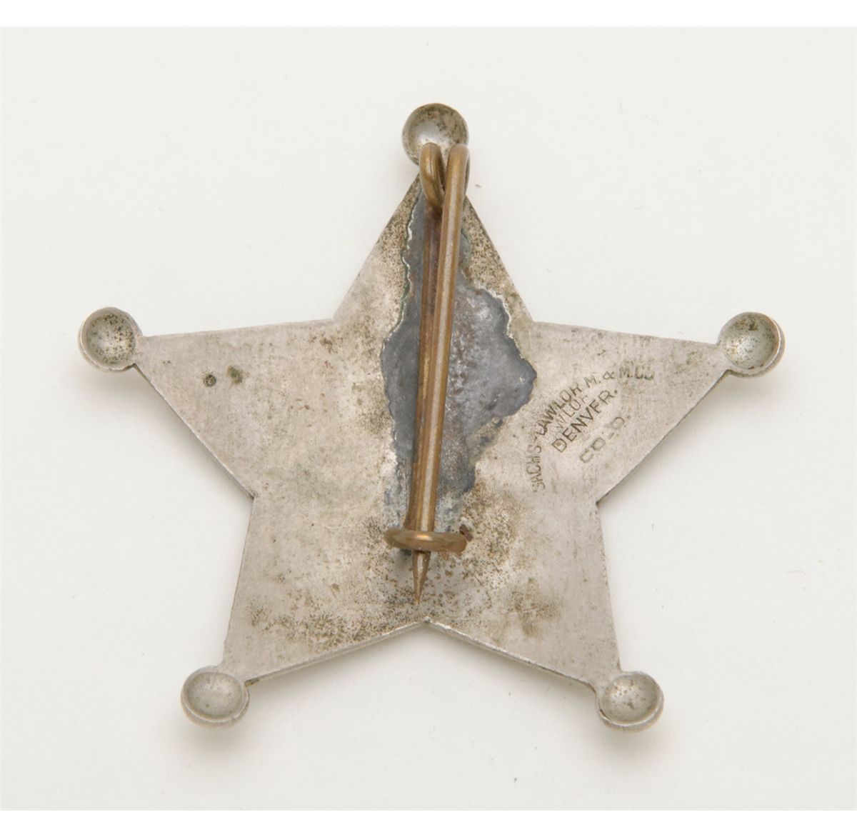 Five pointed star badge marked “DEPUTY SHERIFF” with makers mark on ...