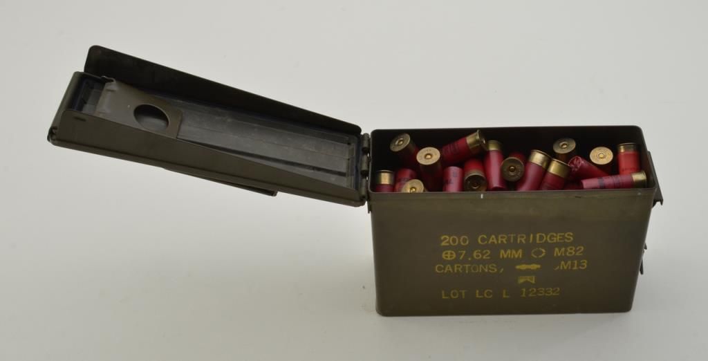 Metal military can with a box of Remington 12 gauge Express Magnum ...