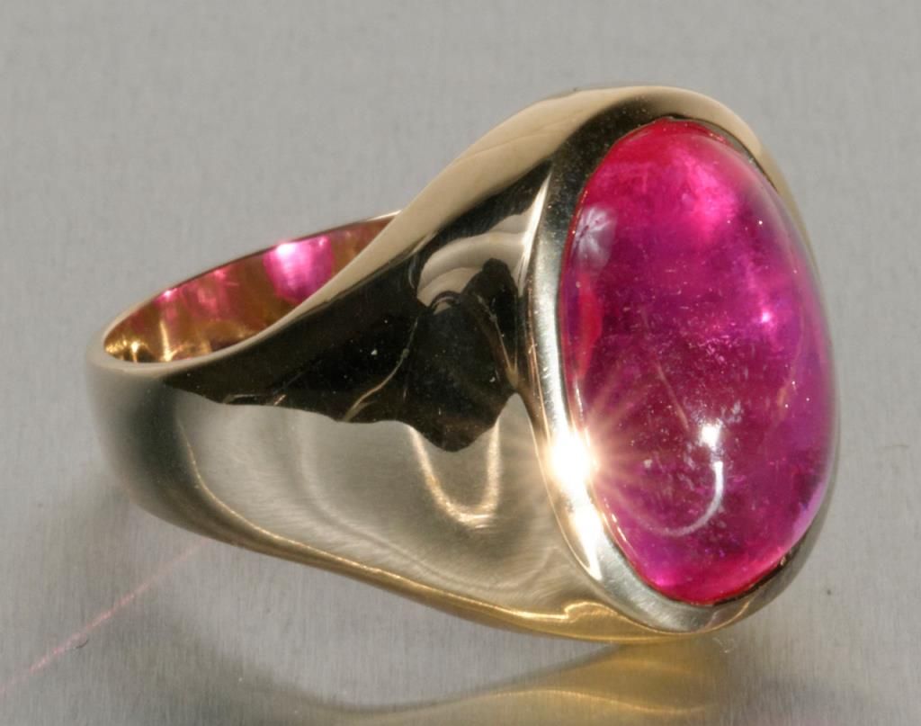 One 14k yellow gold men's ring set with a 16x14 oval cabochon ruby ...