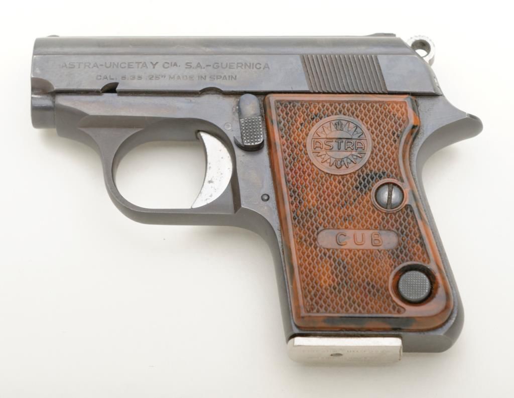 Astra Cub semi-auto pistol, 6.35mm cal., 2-1/4” barrel, blue finish, mottled brown checkered plastic