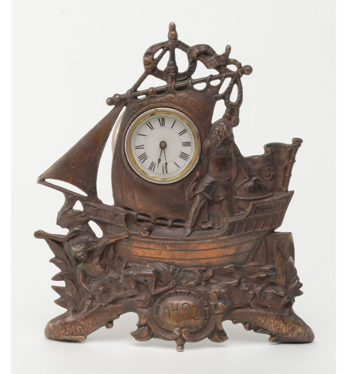 A wall clock made of heavy copper relief depicting Christopher Columbus ...